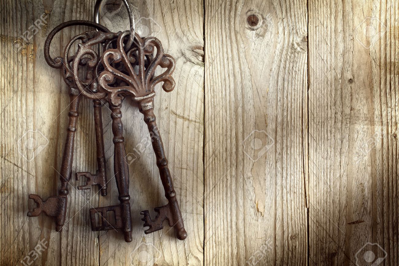 Download Old Skeleton Keys Hanging Against A Wooden Background Stock Download Old Skeleton Keys Hanging Against A Wooden Background Stock