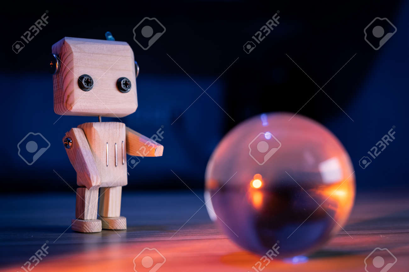 🔥 Free download A Small Wooden Toy Robot Looks At A Magic Glass Ball In ...