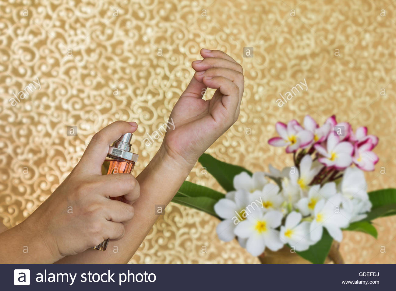 Free download Women hand spraying perfume at wrist with flowers in vase ...