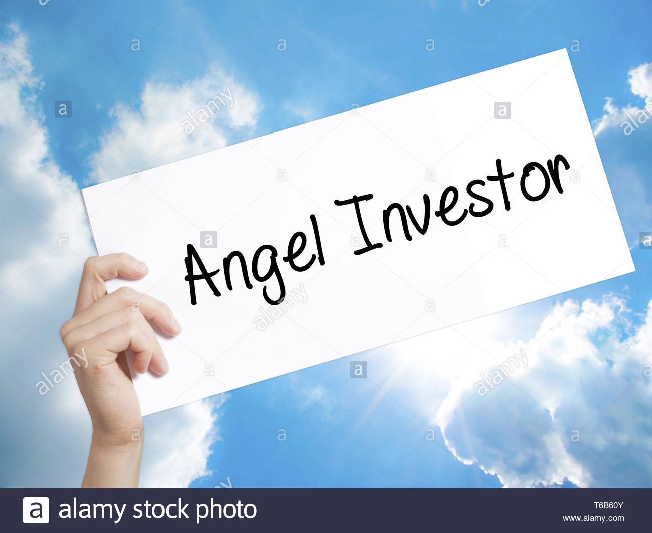 Free download Angel Investor Sign on white paper Man Hand Holding Paper ...