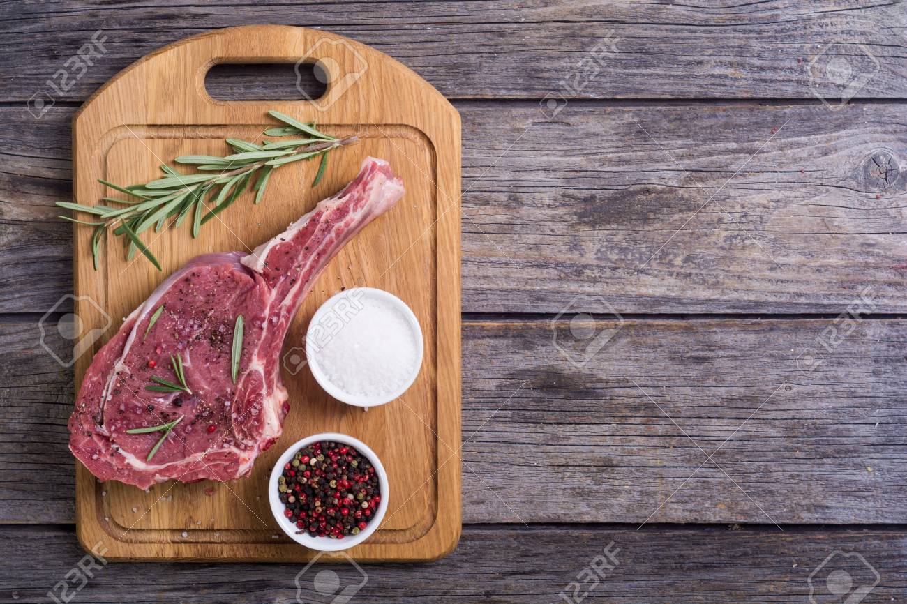 Free download Slices of beef steak on meat fork on dark wooden ...