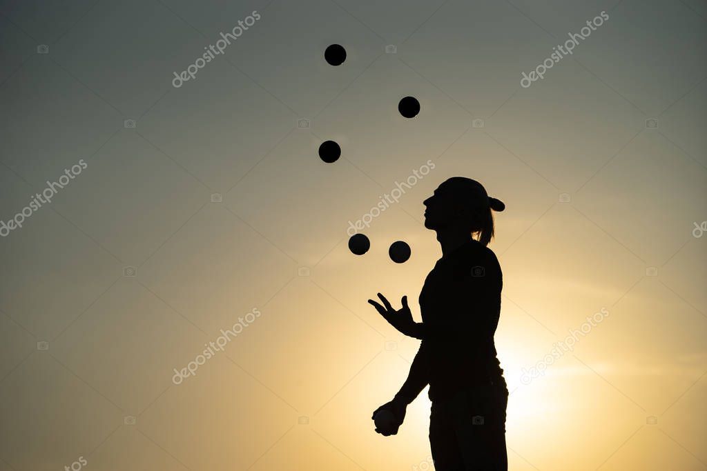 🔥 Free Download Silhouette Of A Man Juggling With Balls At Sunset Stock ...